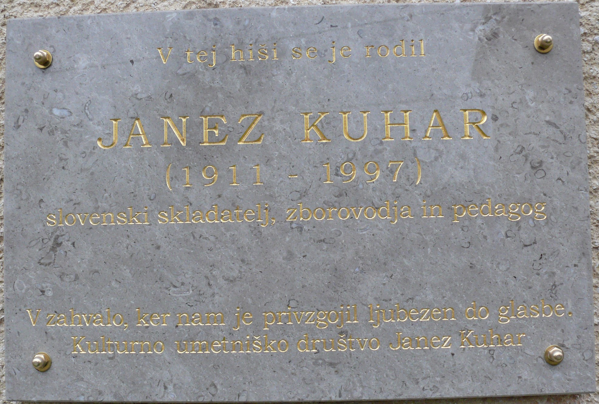 Commemorative Plaque to Janez Kuhar – Momus